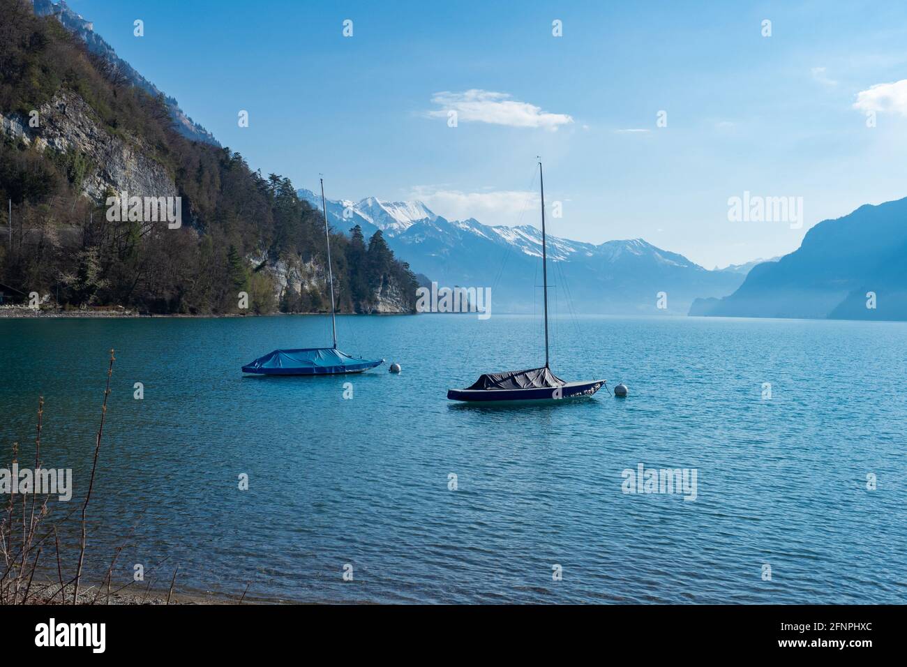 Two boats lying at the shore of lake, Brienzersee, Switzerland Stock ...
