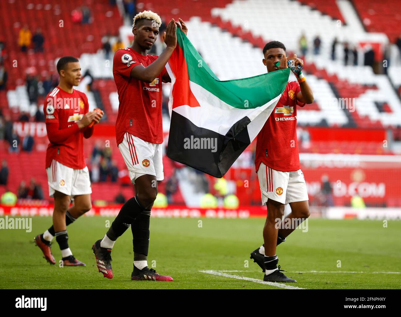 Manchester United's Paul Pogba (left) and Manchester United's Amad ...