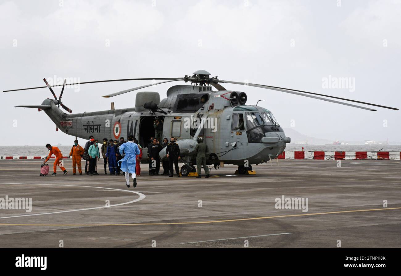 Mumbai, India. 18th May, 2021. An Indian Navy helicopter carrying ...