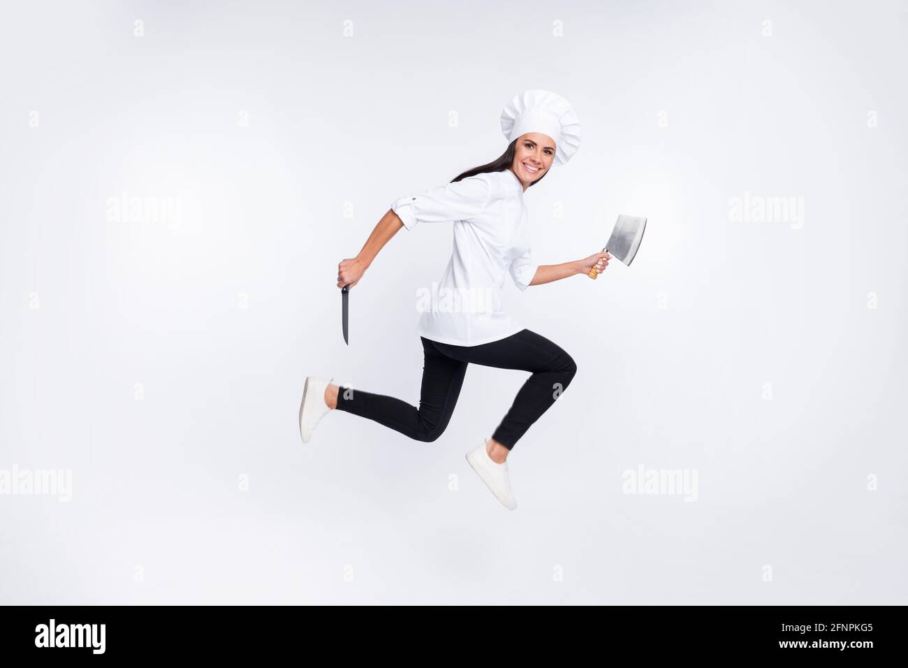 Full body profile portrait of active person rush fast hold knives look ...