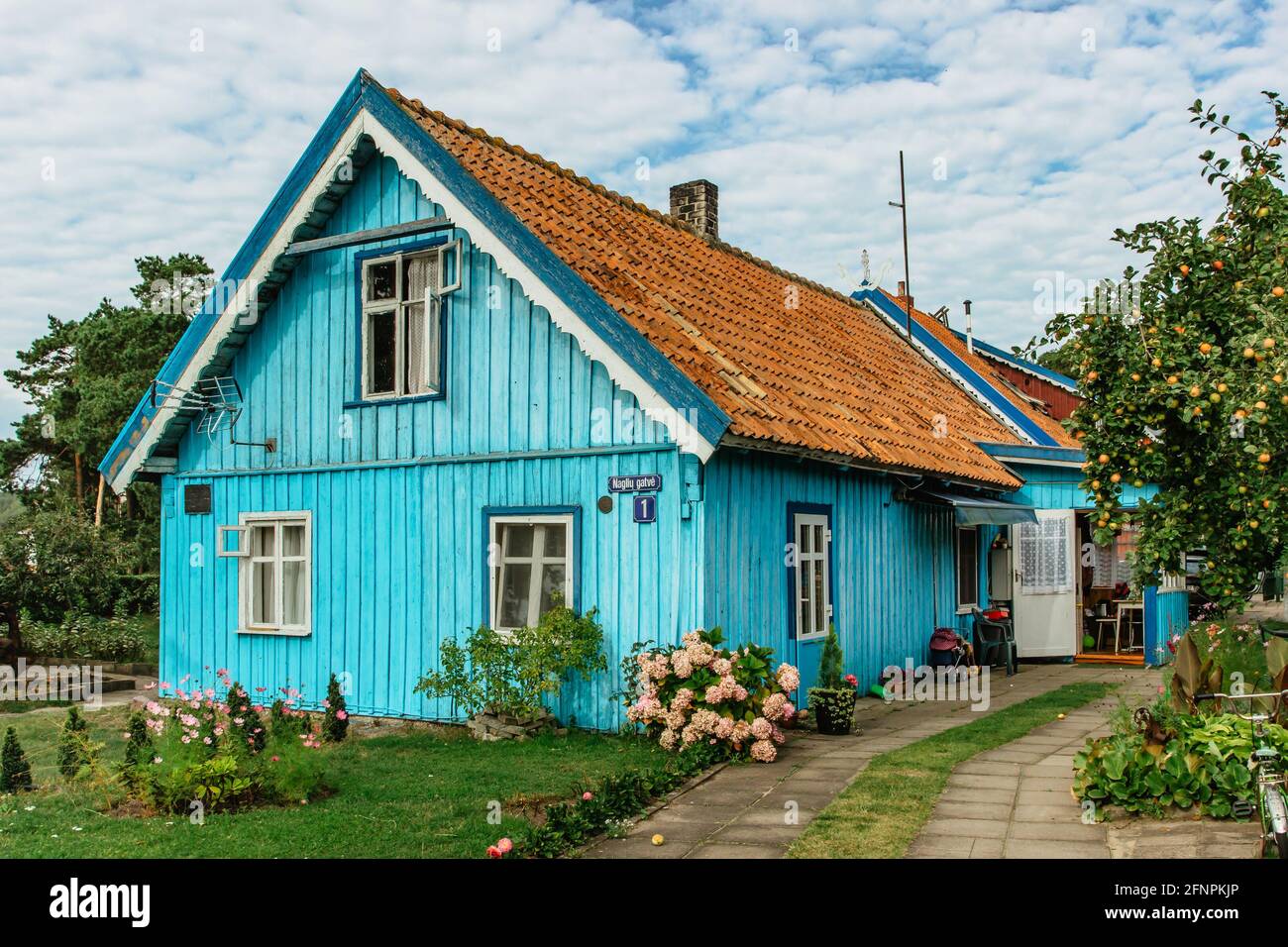 Nida,Lithuania- August 10,2019. Beautiful colorful traditional wooden ...