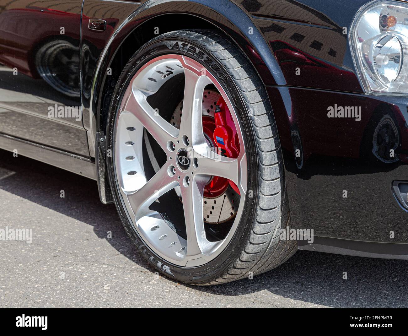Samara, Russia - May 15, 2021: Modern car wheel with light alloy disc and low profile tire Stock ...
