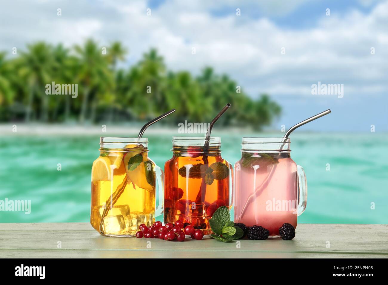 Tasty cold ice tea on table in beach bar Stock Photo - Alamy