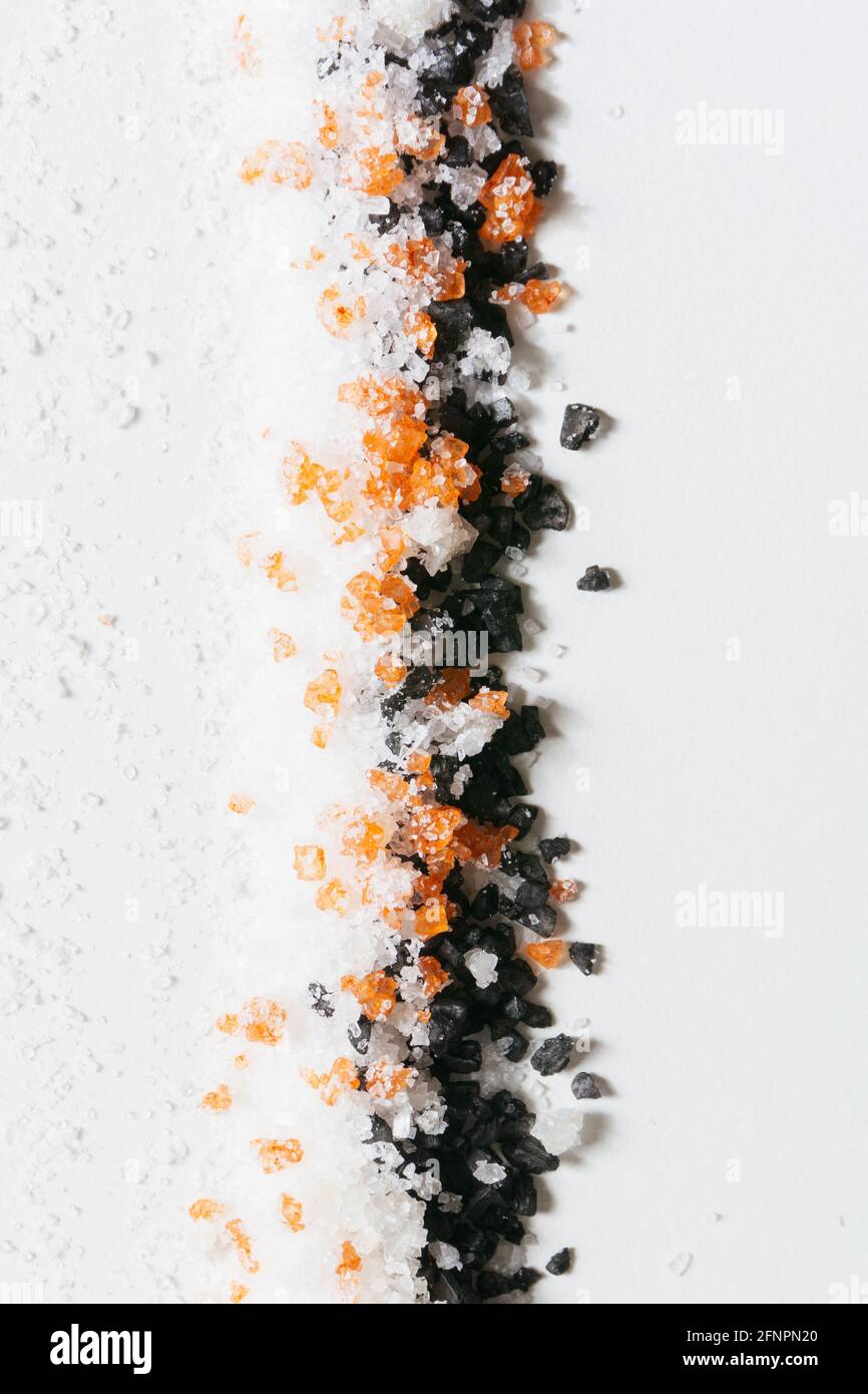 Salt crystal background, grey sea salt, Hawaiian red and black sea ...