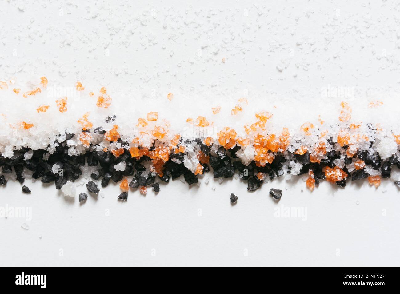 Salt crystal background, grey sea salt, Hawaiian red and black sea ...