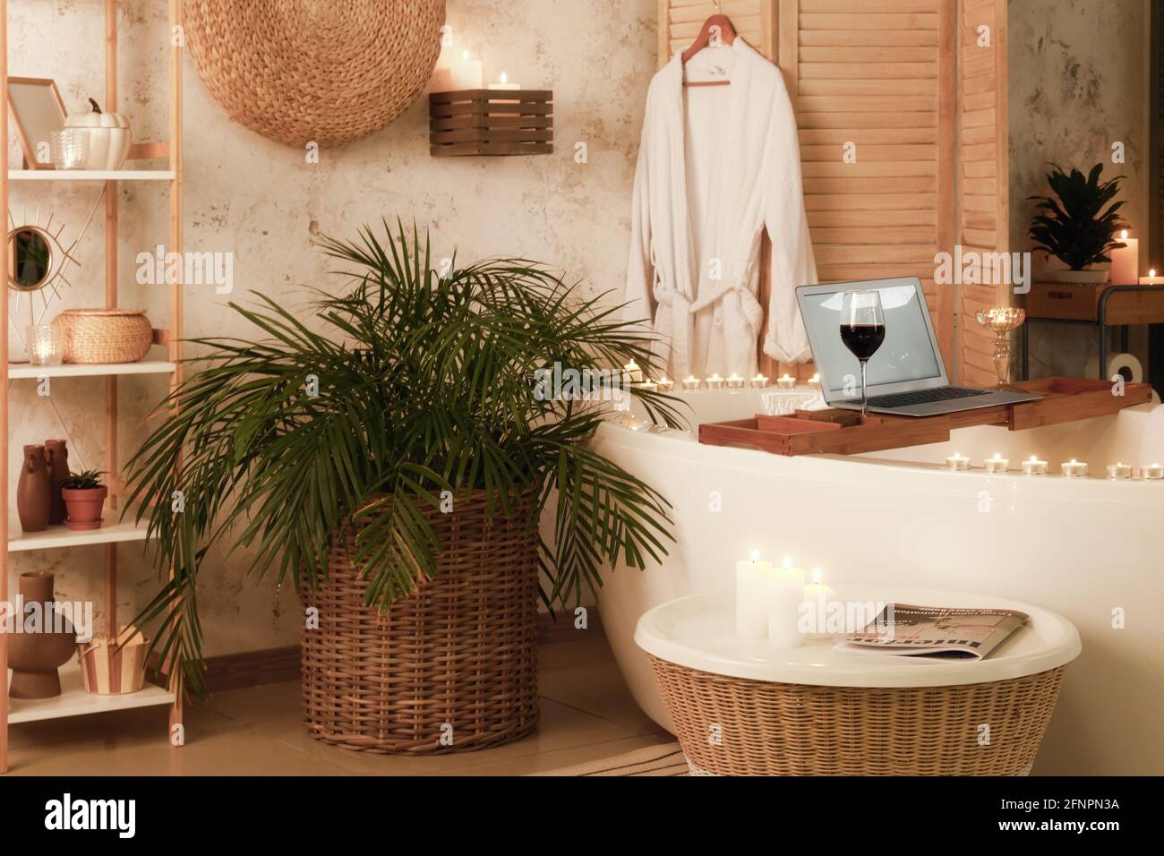 Use the laptop in the bathroom hi-res stock photography and images - Alamy