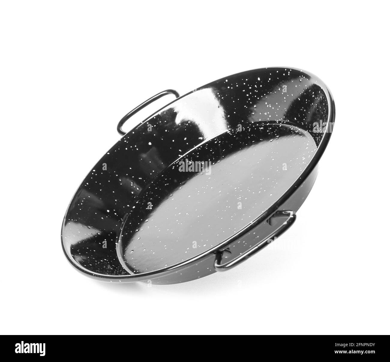 Clean frying pan on white background Stock Photo - Alamy