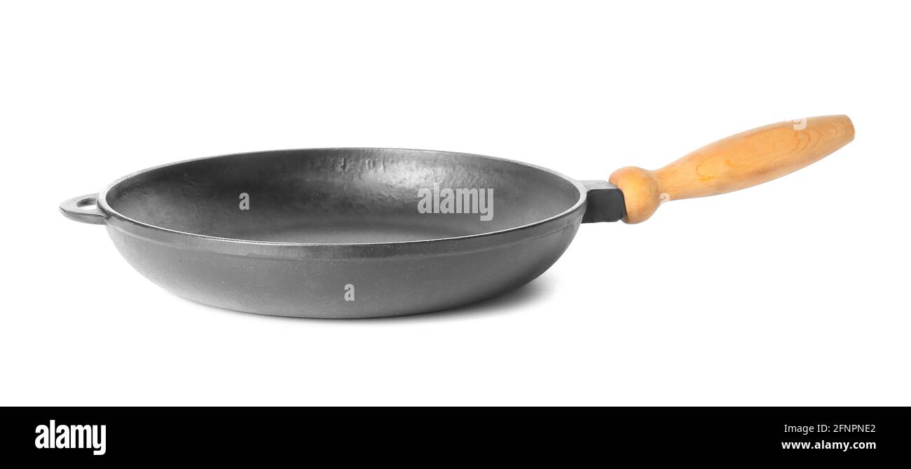 Clean frying pan on white background Stock Photo - Alamy