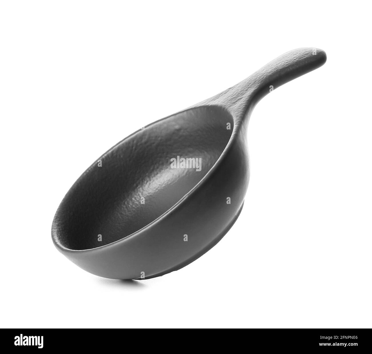 Clean frying pan on white background Stock Photo - Alamy