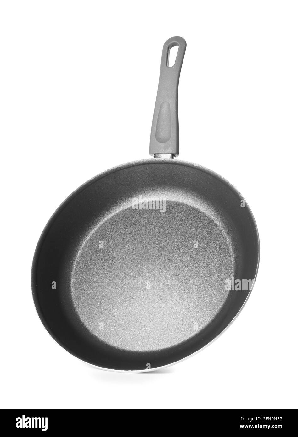 Clean frying pan on white background Stock Photo - Alamy