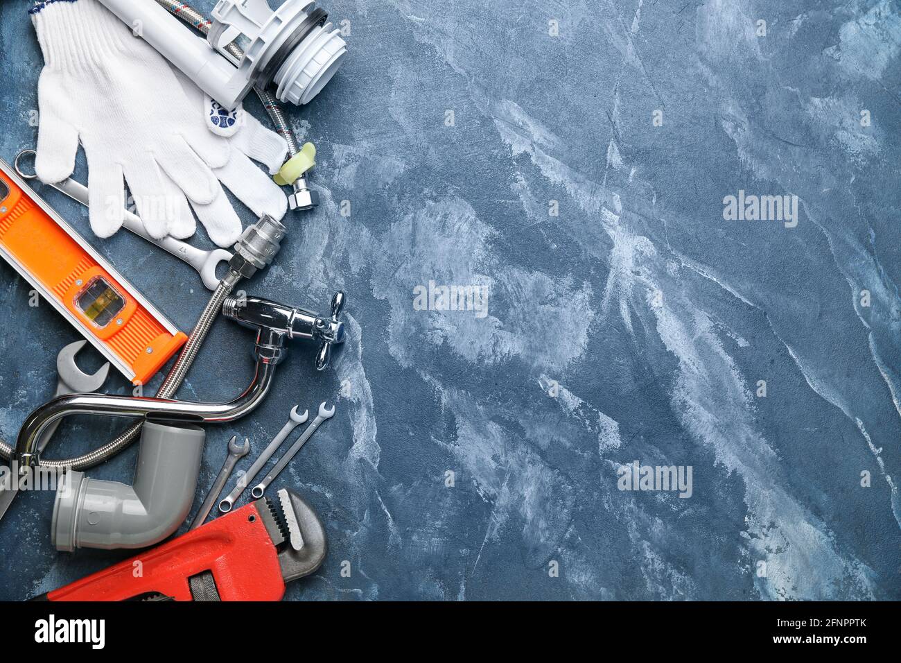 Set of plumber's items on color background Stock Photo - Alamy