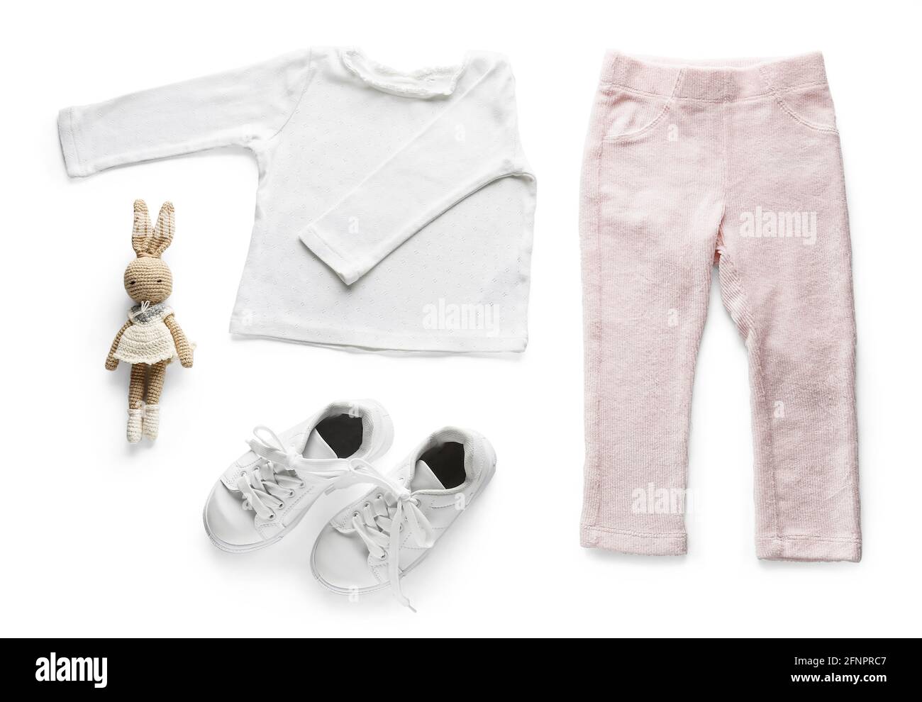 Set of child's clothes on white background Stock Photo - Alamy