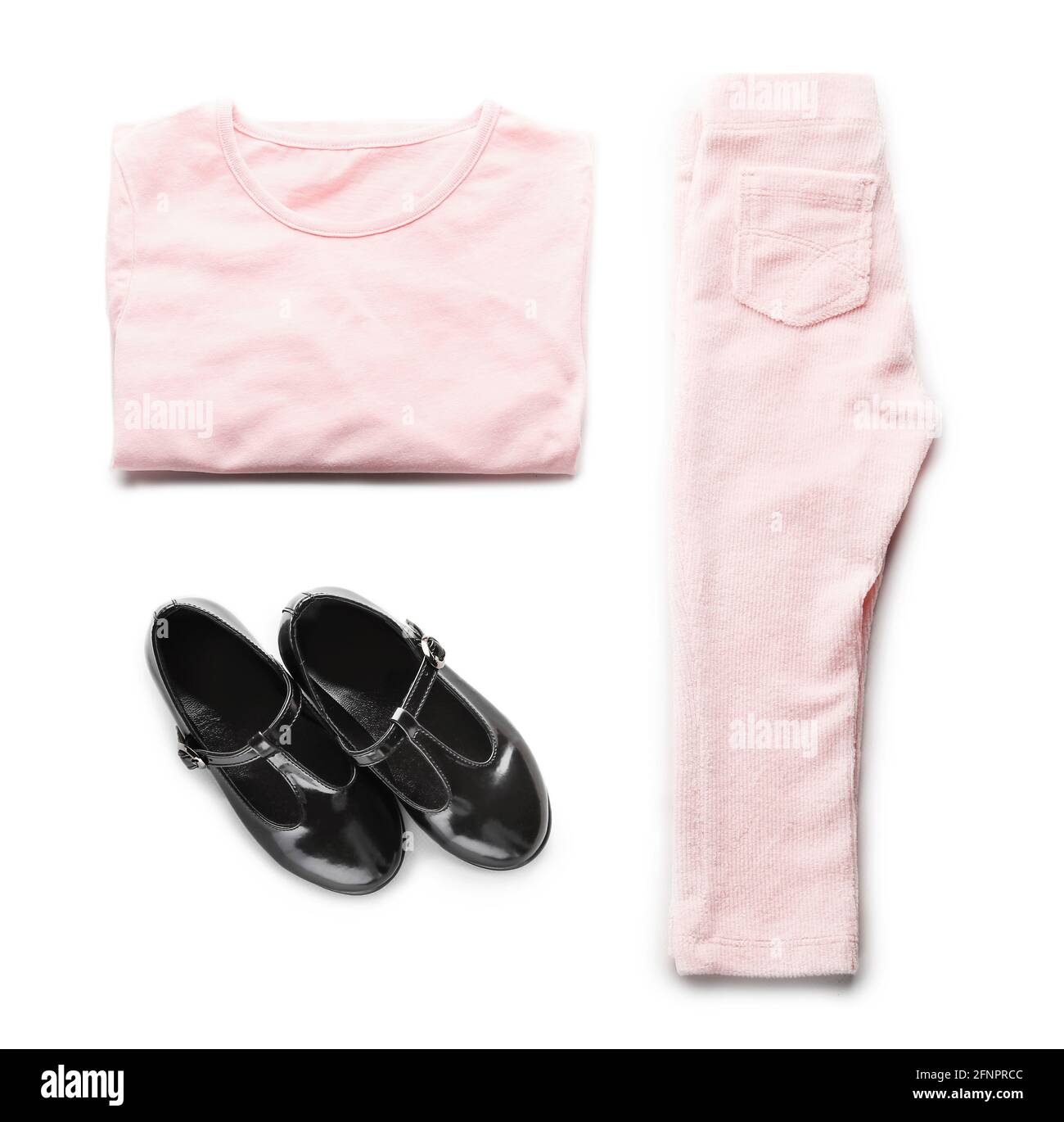 Set of child's clothes on white background Stock Photo - Alamy