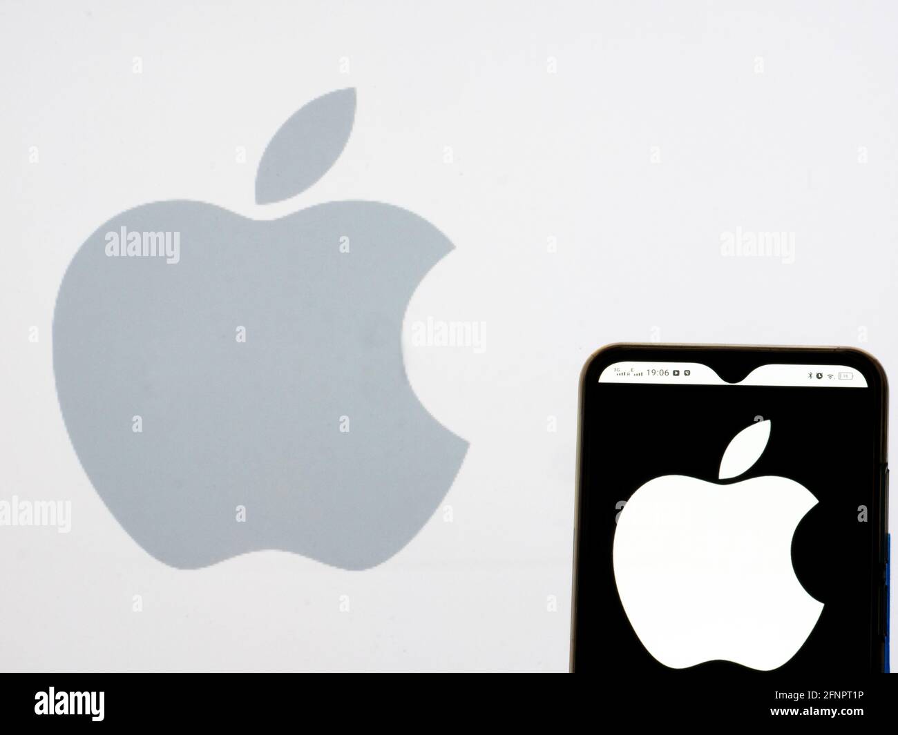 In this photo illustration Apple Inc. logo seen displayed on a ...