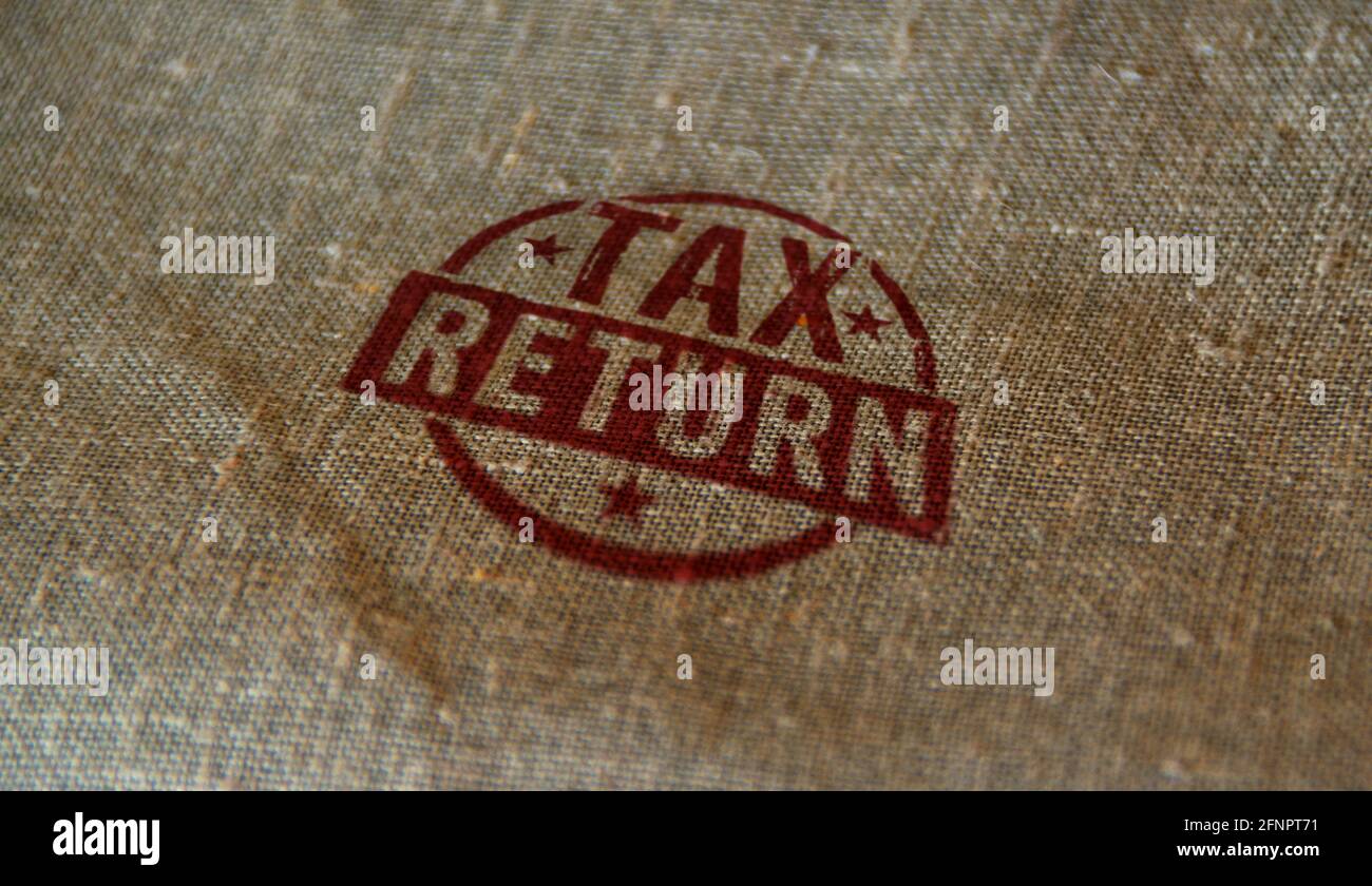 Tax return stamp printed on linen sack. Taxation refund, financial ...