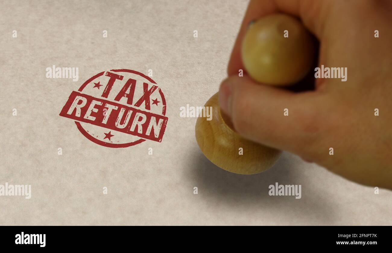 Tax return stamp and stamping hand. Taxation refund, financial ...
