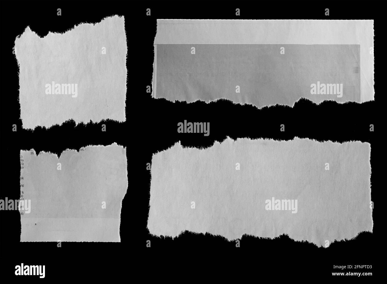 Four pieces of torn newspaper on black background Stock Photo - Alamy