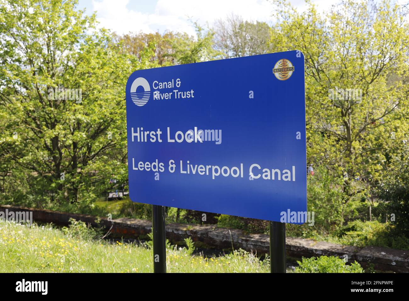 Hirst Lock sign at Saltaire on the Leeds & Liverpool Canal Stock Photo ...