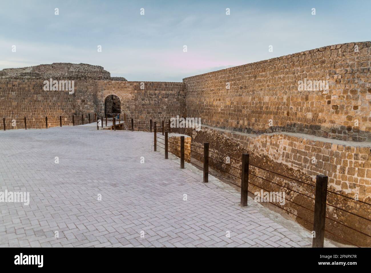 Gate of Bahrain Fort Qal'at al-Bahrain in Bahrain Stock Photo - Alamy