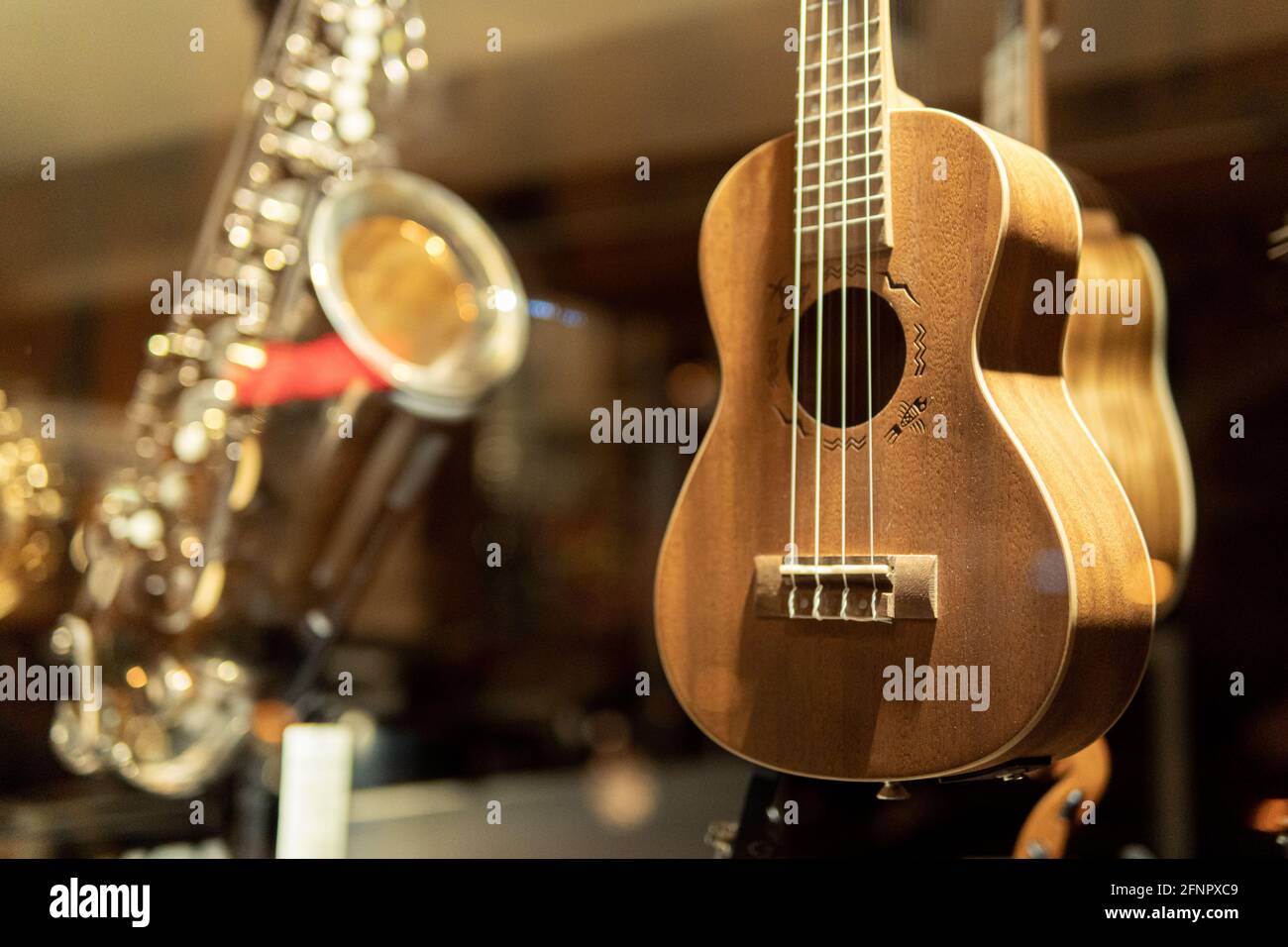 Brown acoustic guitar hi-res stock photography and images - Alamy