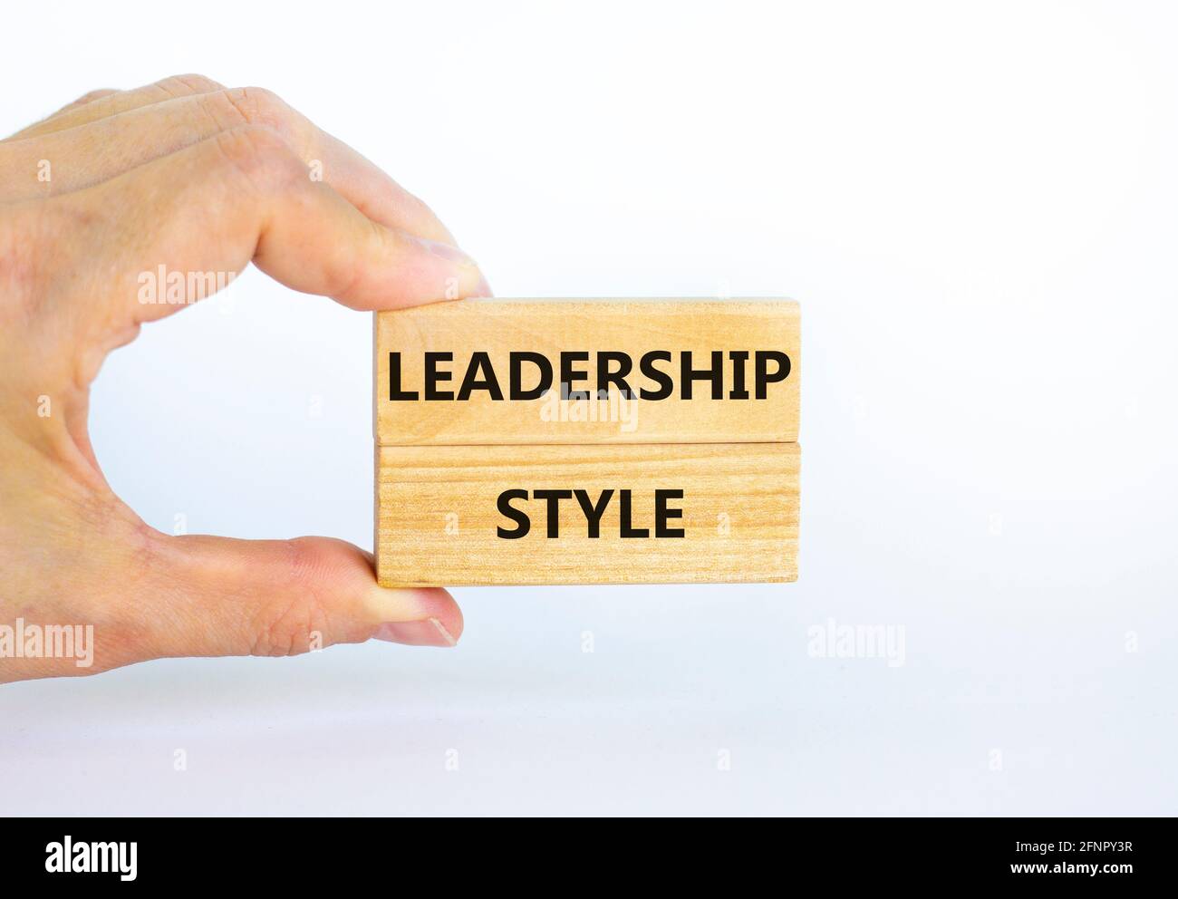 Leadership style symbol. Wooden blocks with words 'Leadership style' on ...