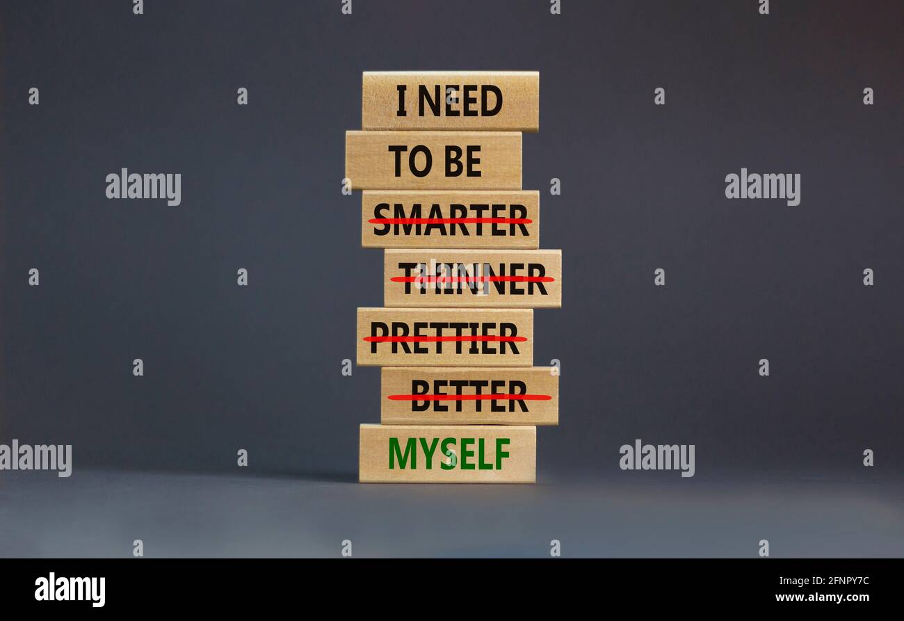 Be myself symbol. Businessman hand. Wooden blocks with words 'i need to ...