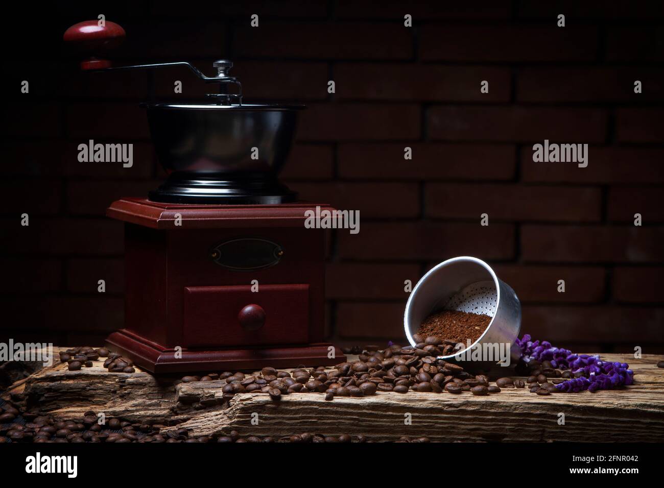 Coffee grinder, coffee filter. Coffee beans and freshly ground coffee ...