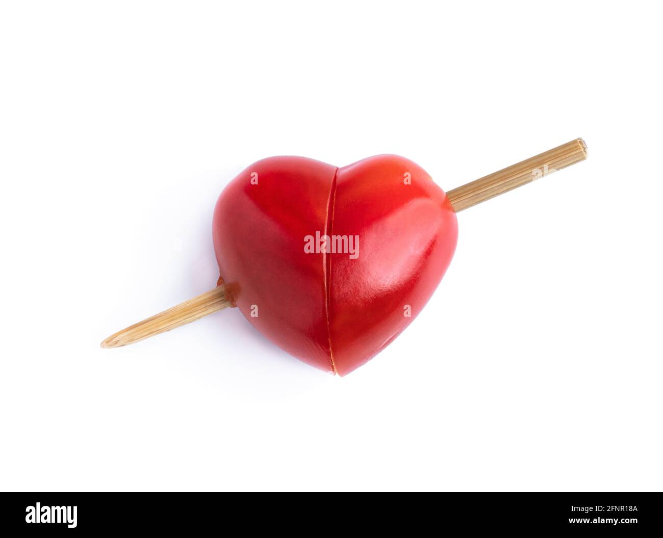 Cherry tomato decorated as a heart shape isolated on white Stock Photo ...