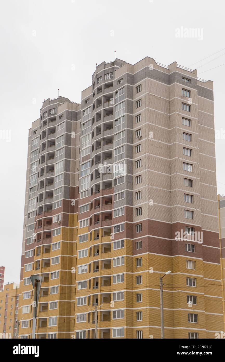 Multi-storey multi-colored high-rise building in a new area of the city ...