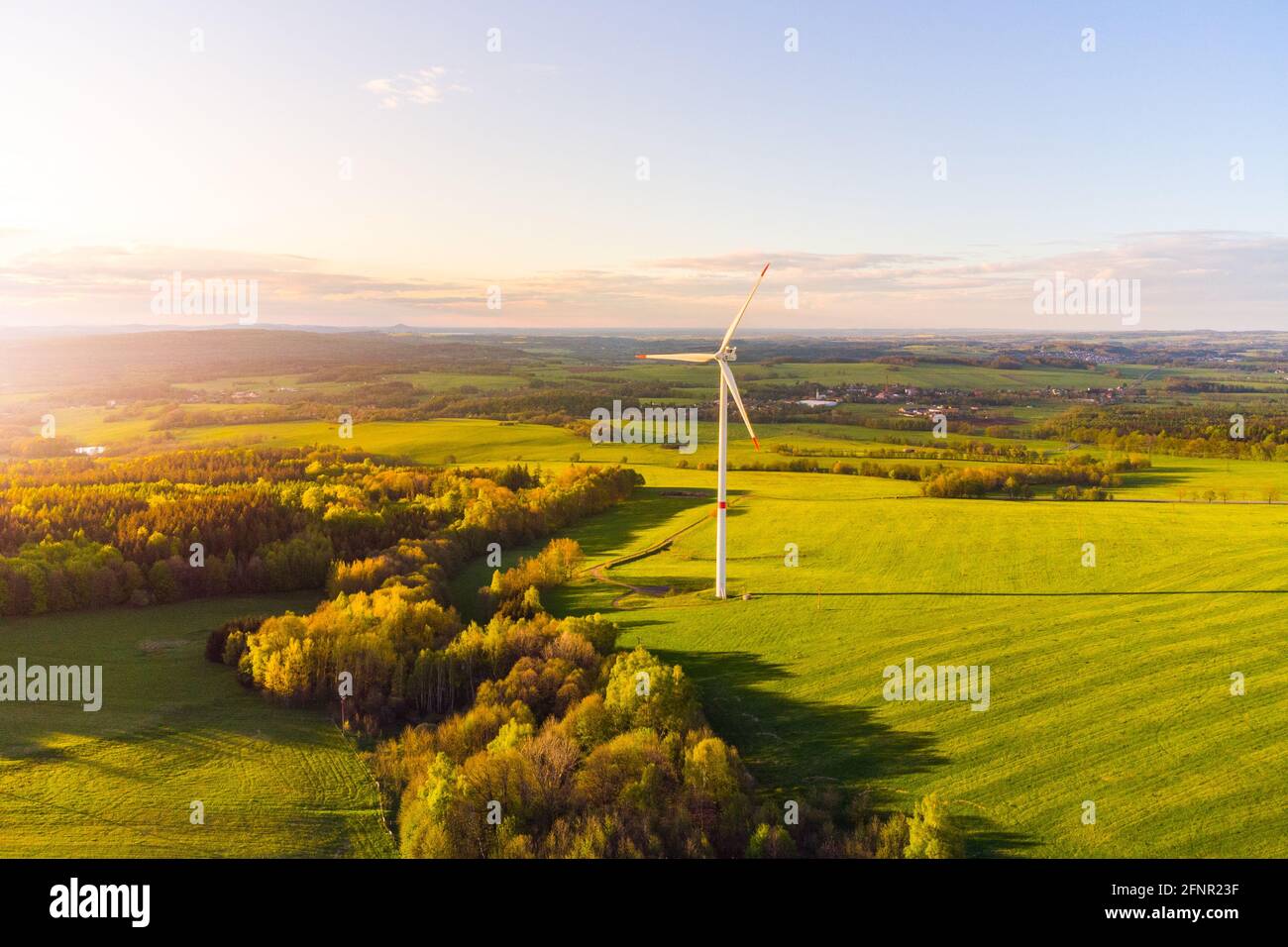Wind turbine in green rural landscape from above Stock Photo - Alamy