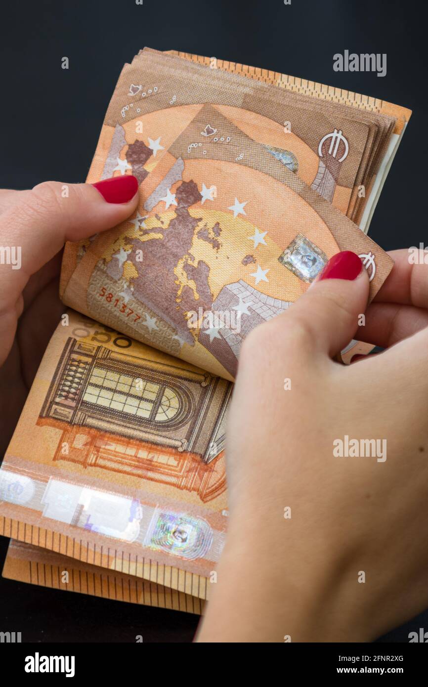 Shot of hands counting EURO banknotes Stock Photo - Alamy