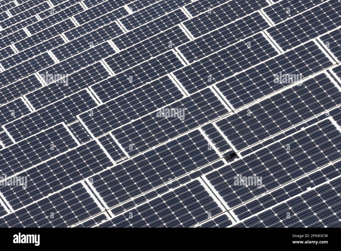 A large field with photovoltaic modules for generating solar power ...