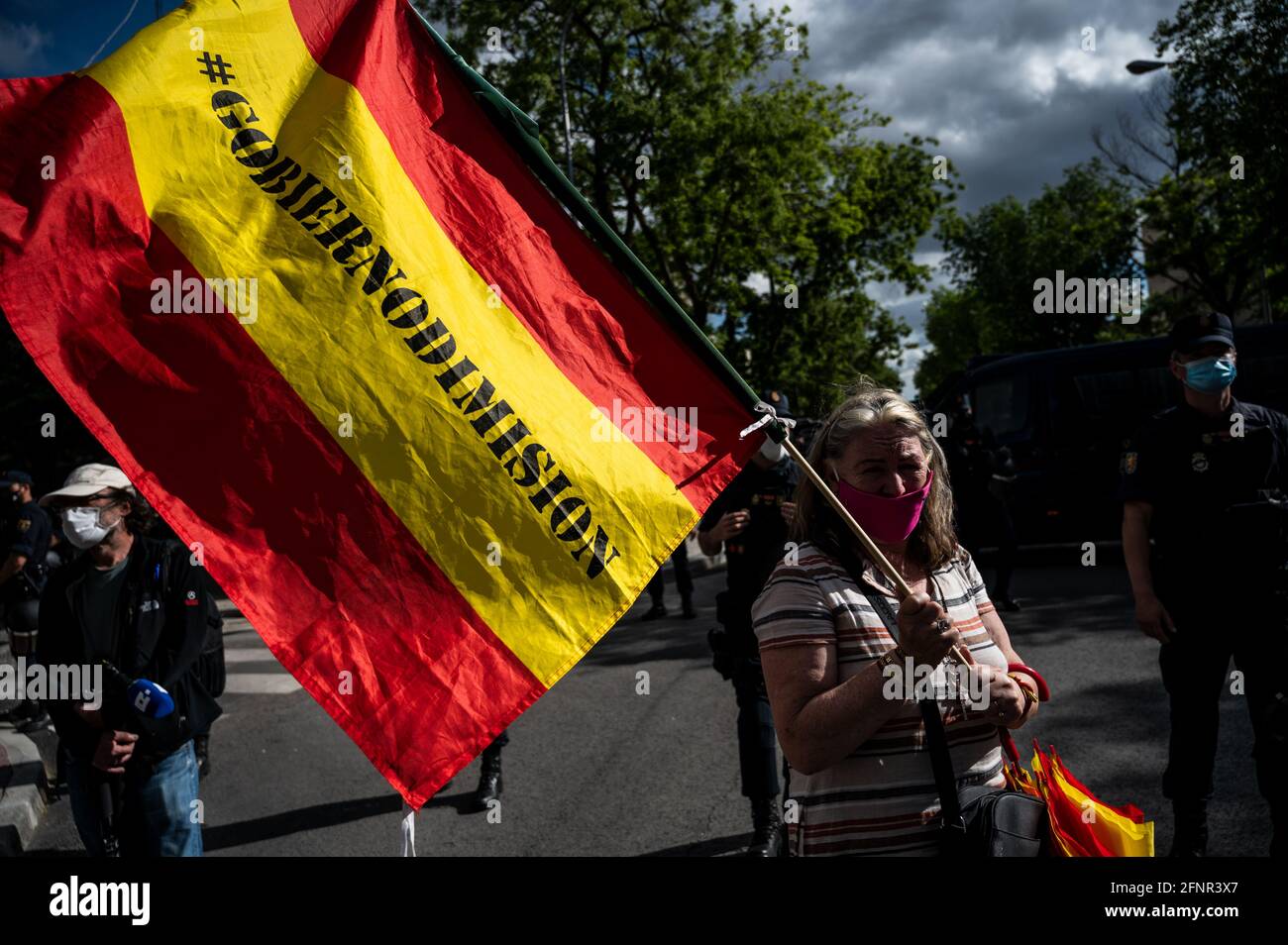 Madrid, Spain. 18th May, 2021. A woman holding a Spanish flag with the ...