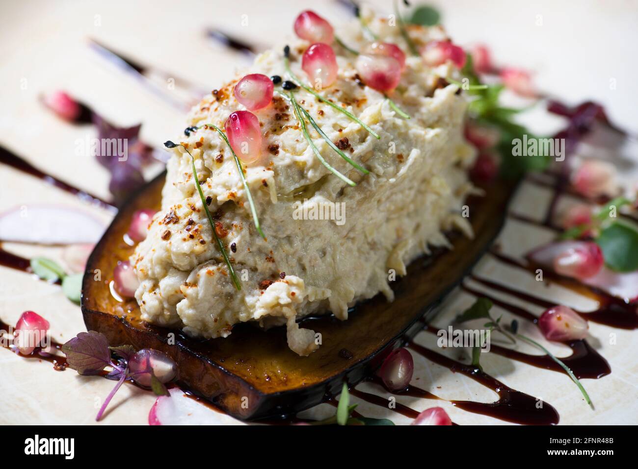 Mutabbal with pomegranate Stock Photo - Alamy