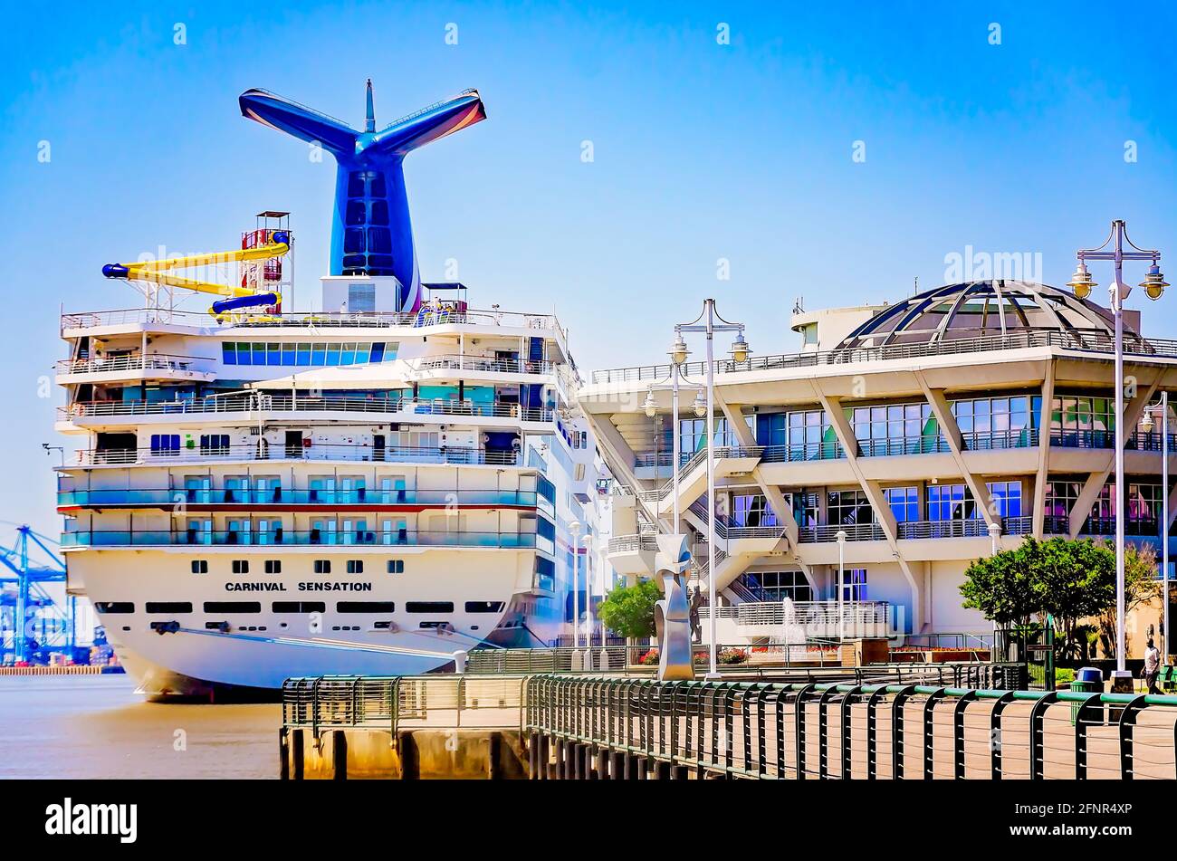 The Carnival Sensation is docked alongside GulfQuest Museum at the ...