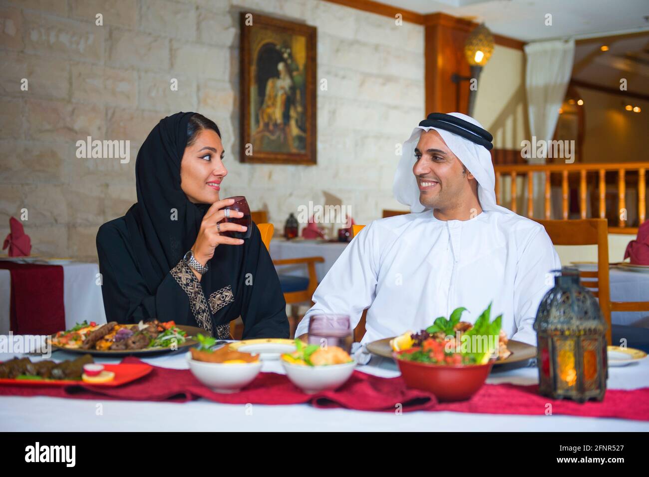 Arabic couple Drinking Tea Stock Photo - Alamy