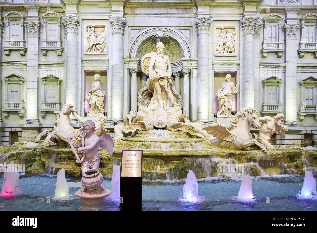 An illuminated replica of the Italian Trevi Fountain in the Lotte World ...