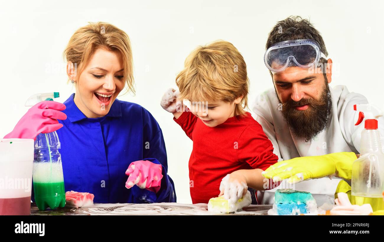 Home cleaning. Family having fun during cleaning together. Playing with ...