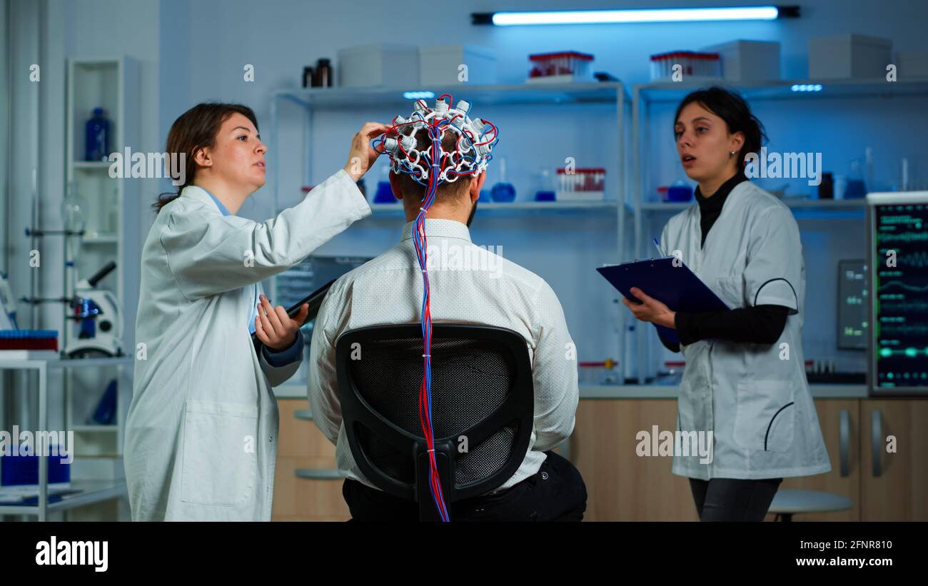 Man patient wearing performant eeg headset scanning brain electrical ...