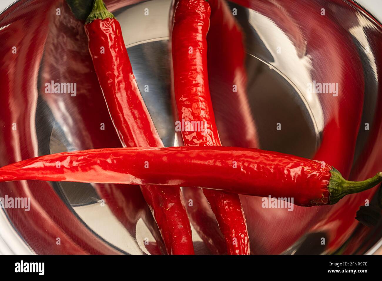 Red pepper pods in a metal dish. ready for consumption. Spicy food ...