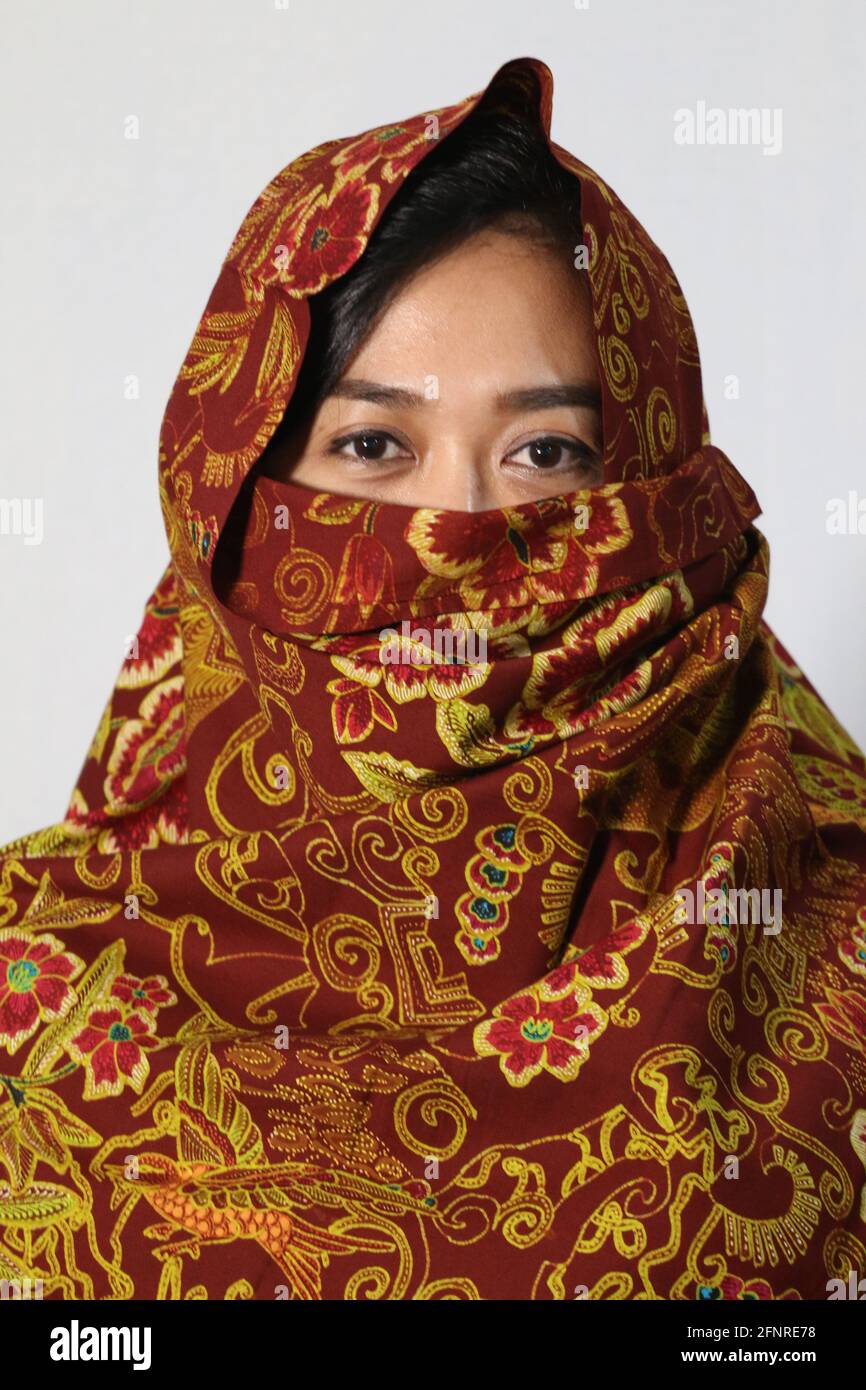 Wearing batik hi-res stock photography and images - Alamy