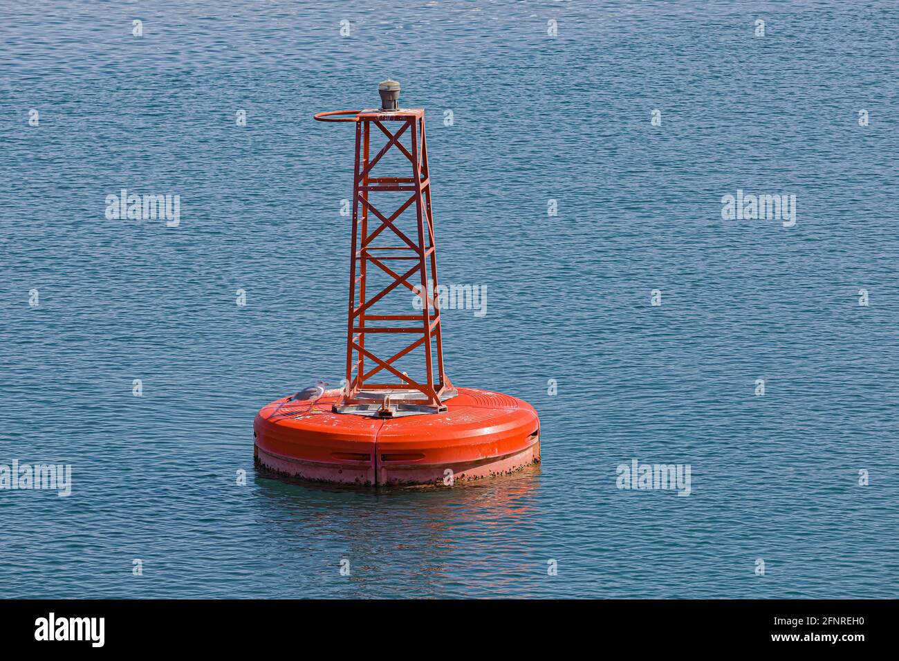 Red beacon on Ionian sea water route Stock Photo - Alamy