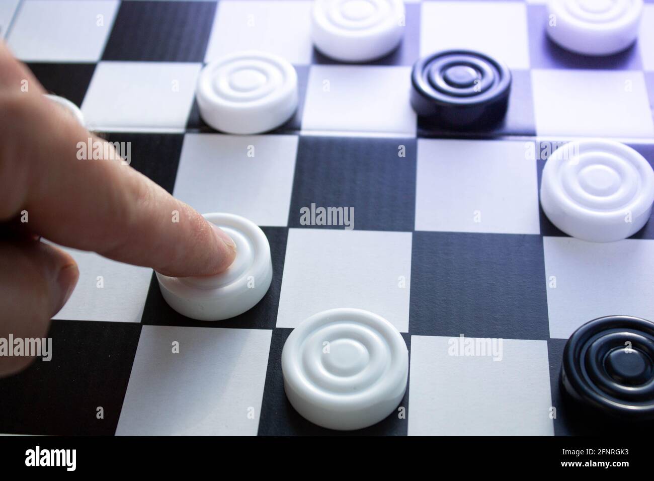 Board game of checkers. Black and white chips for the game. Chess field ...