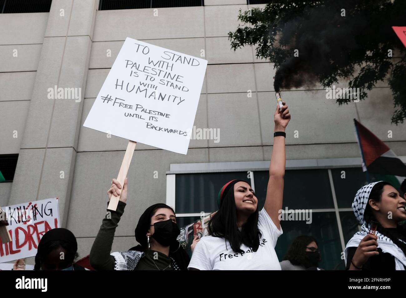 Atlanta, Georgia, USA. 18th May, 2021. A crowd of protesters hold a ...