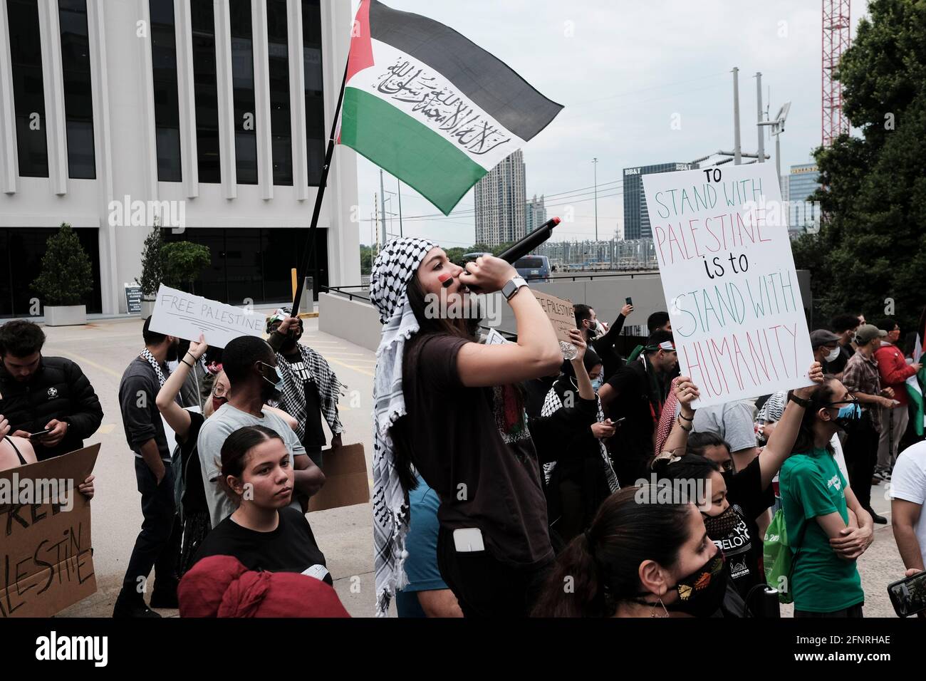 Atlanta, Georgia, USA. 18th May, 2021. A crowd of protesters hold a ...