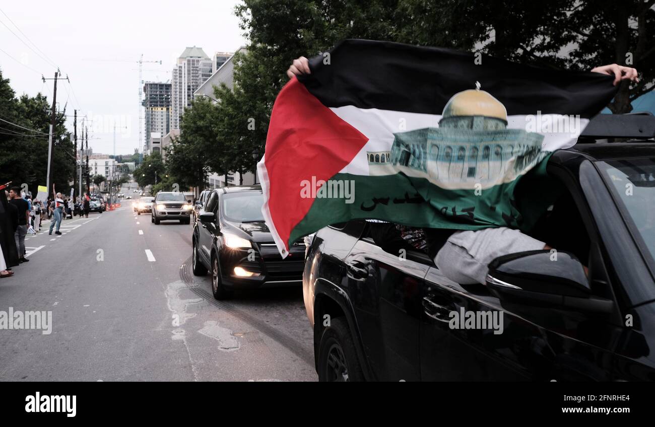 Atlanta, Georgia, USA. 18th May, 2021. A crowd of protesters hold a ...