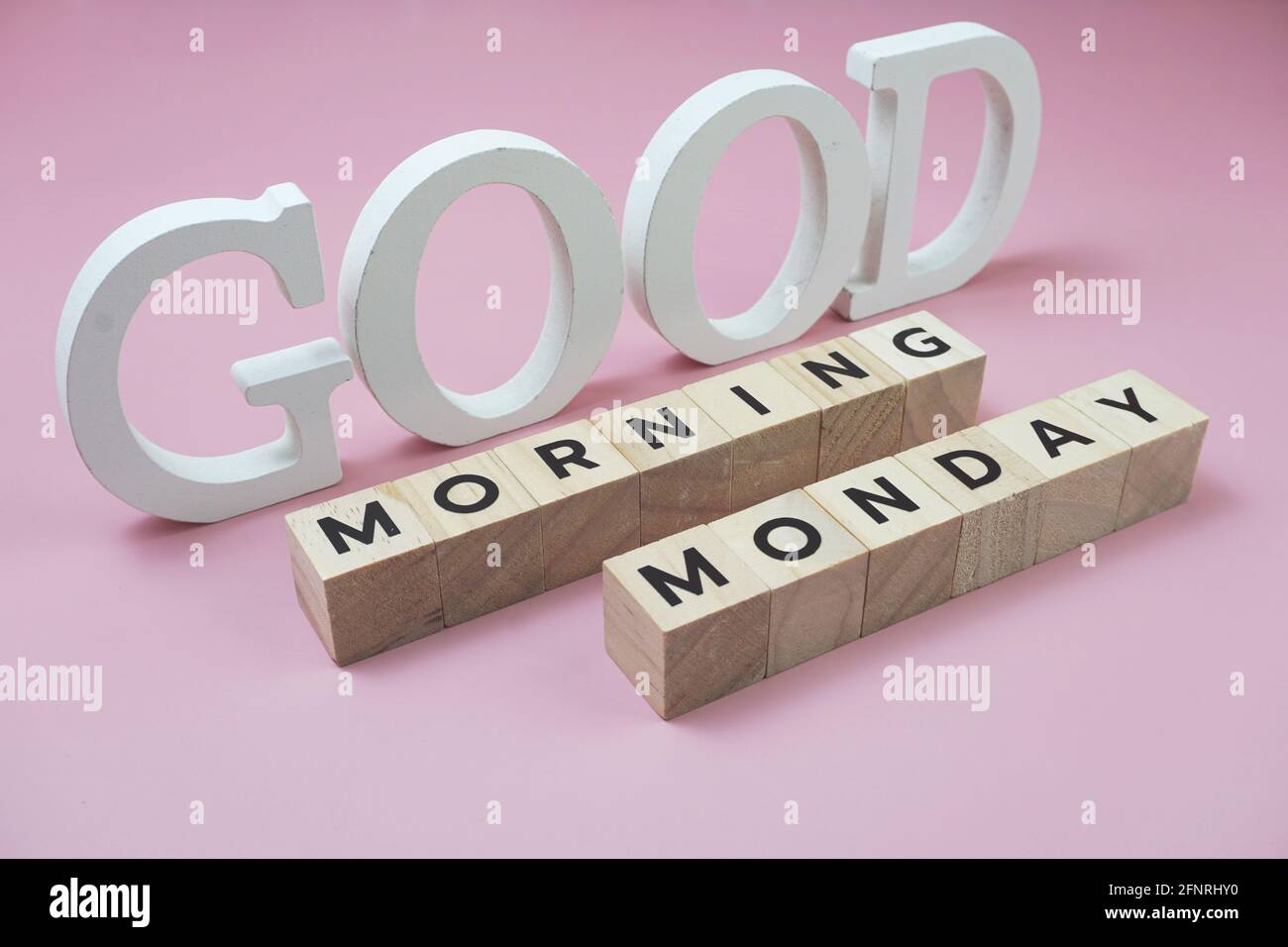 Good Morning Monday Word alphabet letters on pink background Stock ...