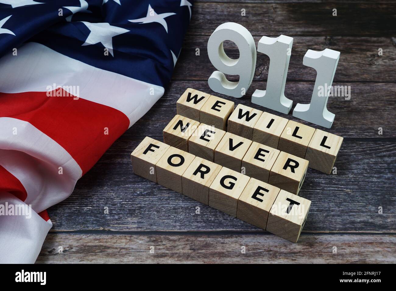 911 We will Never Forget Word alphabet letters on wooden background ...