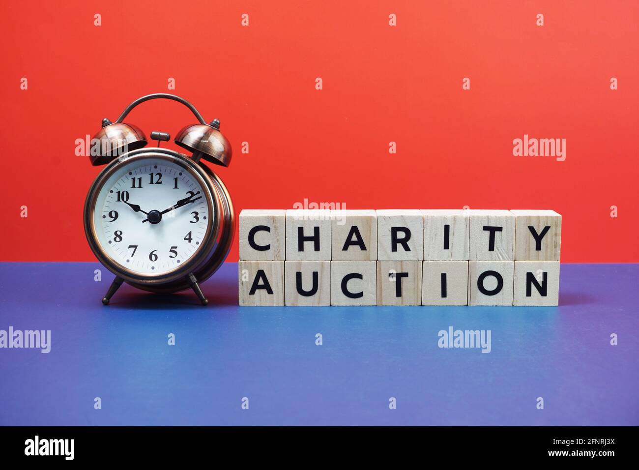 Online Auction alphabet letter with alarm clock on blue and red ...