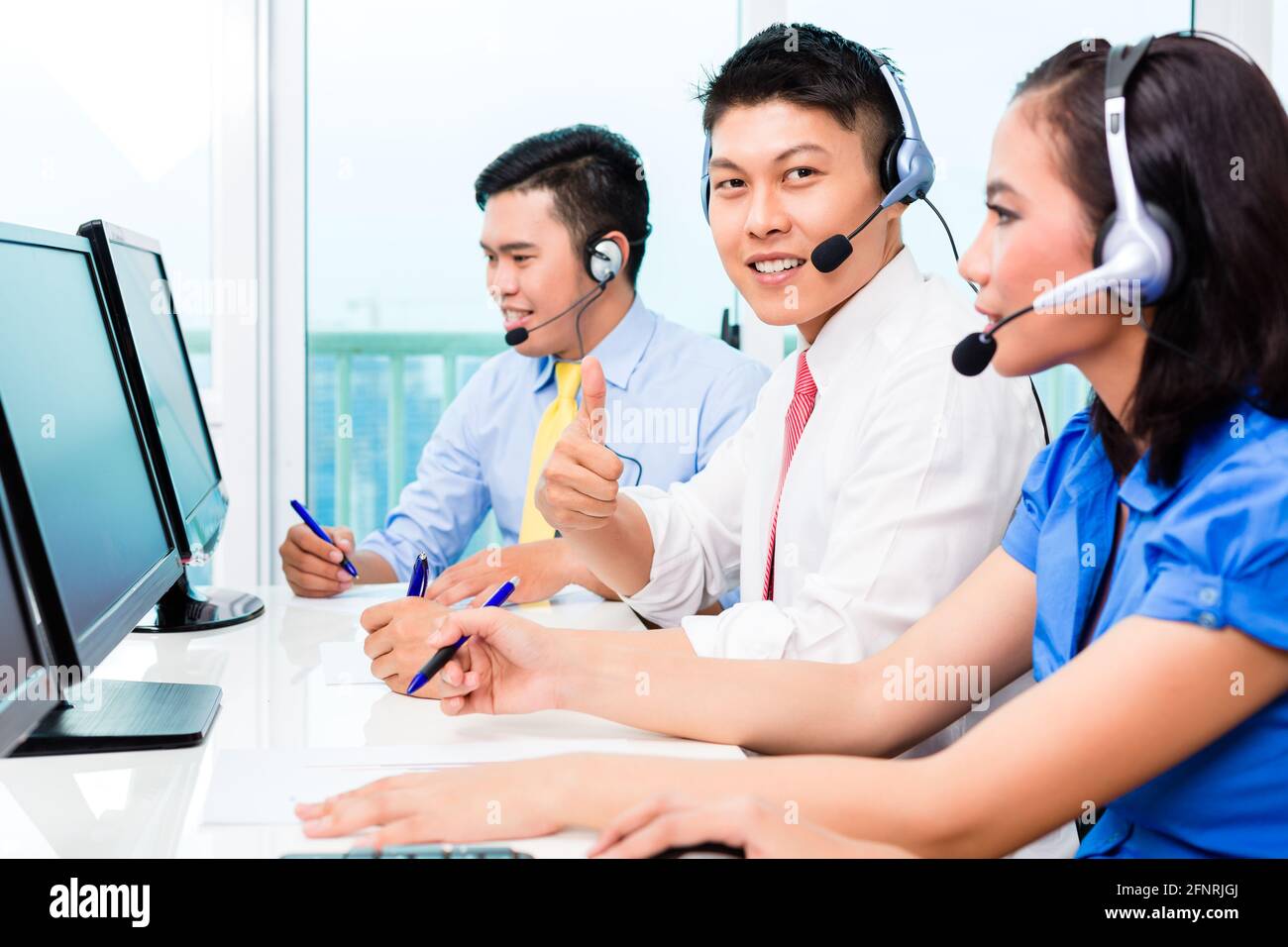 Asian chinese call center agent hi-res stock photography and images - Alamy